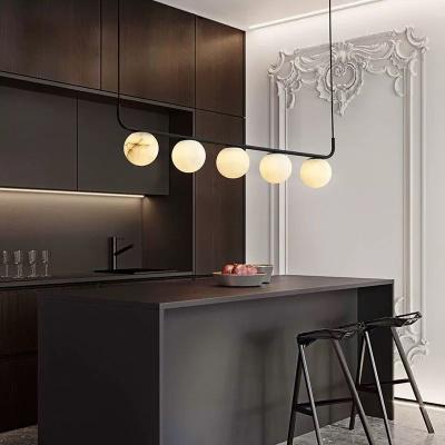 China Lâmpada de colar do restaurante moderno de ferro por atacado Para quarto Lâmpada de colar do quarto Sala de jantar luxuosa Alabastro Lâmpada de colar de bola de mármore for sale