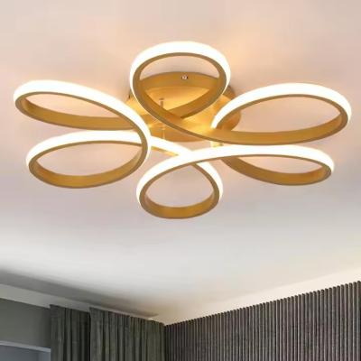 China Dimmable Gold Surface Mounted Led Acrylic Ceiling Light Minimalist Creative Ring Hanging Light Flower Shape Modern for sale