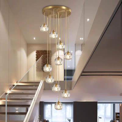 China 15 KG Futebol de Cristal Todo Cobre Luz de Cristal Sala de estar luxuosa Apartamento Villa Sala de estar rotativa Escalão Lâmpada de pendente longa for sale