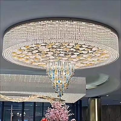 Cina Stile post-moderno candelabro personalizzato Hotel Lobby Business Center Grande cristallo lusso rotondo pendente a goccia d'acqua luce di soffitto a LED in vendita