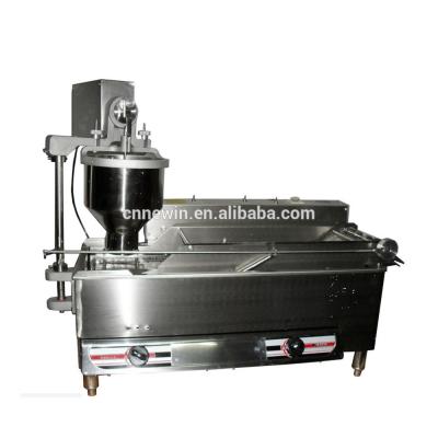 Cina La macchina automatica industriale della ciambella del dolce funziona in elettrico e gas in vendita