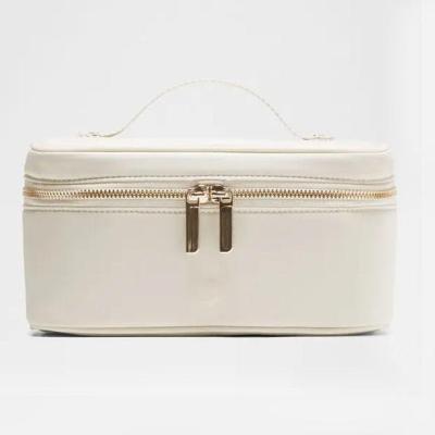 China Portable Vegan Leather Cosmetic Cases With Top Handle Double Zipper Custom Logo for sale