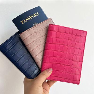 China Embossed Crocodile PU Leather Business Travel Passport Cover Men Women Custom Letters for sale