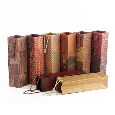 China Custom Printed Brown Kraft Paper Wine Gift Bags With Cotton Handles Bulk for sale