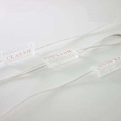 China Eco-Friendly Transparent Plastic Self Locking Tags Security Tags Embossed Logo for sale