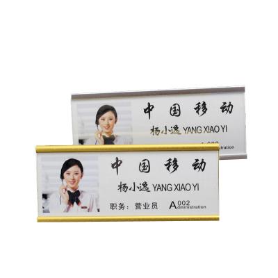China Oro en blanco Reutilizables Etiquetas de nombre de la enfermera insignia de nombre con alfiler de seguridad mayorista o minorista en venta