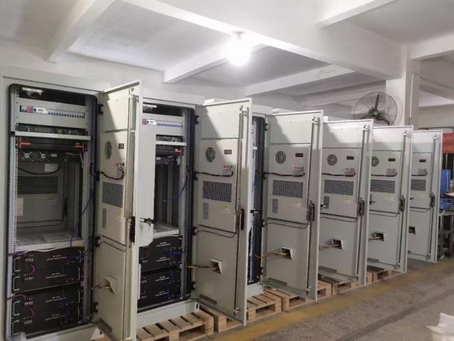 outdoor enclosure with cooling and power system