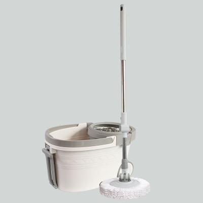 China Barrel Automatically Rotates Easy Wring Spin Mop And Bucket 360 Rotating For House Cleaning for sale