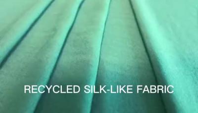 China Low Moq Manufacturer Recycled Poly Island Dot Recycle Fabric for sale