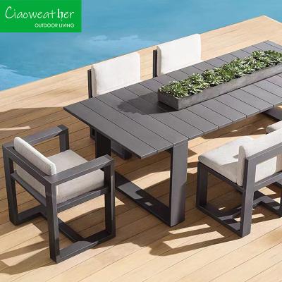 Cina Set da pranzo in legno massello di design moderno per mobili esterni Sedile laterale e poltrona in legno di teak nel giardino del cortile in vendita