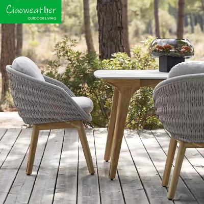 China Outdoor Garden Courtyard Waterproof Fabric Dining Chair with Teakwood Frame and NO Folded Design for sale