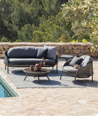 中国 Outdoor Light Luxury PE Rattan Sofa Table Set Patio Waterproof Aluminum Furniture 販売のため
