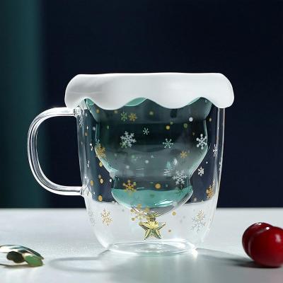 China Merry Christmas Reusable Double Wall Cup High Borosilicate Glass Cup With Handle for sale