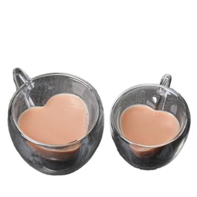 China Heart Shaped Double Walled Glass Coffee Cup With Handle Heat Resistant Drinkware for sale