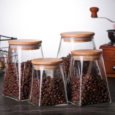 China Fancy Hand Blown Trapezoid Borosilicate Glass Storage Jars With Bamboo Lids for sale