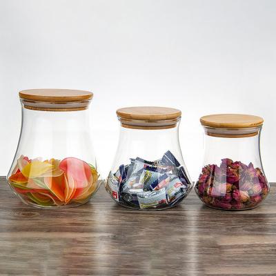 China Heat Resistance Borosilicate Glass Canister Jar With Airtight Bamboo Lid Food Storage for sale