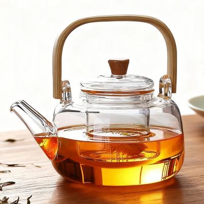 China Eco Friendly Glass Tea Pot Transparent Glass Kettle With Wooden Lid Large Capacity for sale