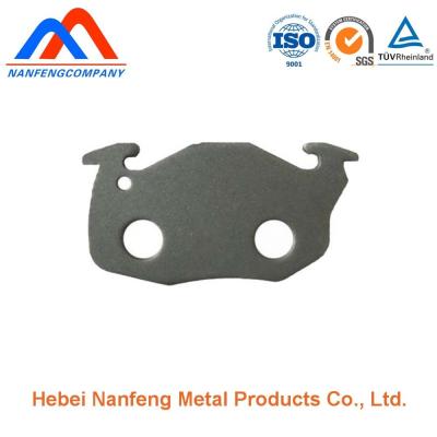 China Peças de estampagem de metal personalizadas para corte de pastilhas de freio à venda