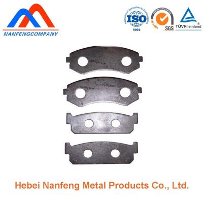 China Peças de estampagem de metal personalizadas para corte de pastilhas de freio à venda