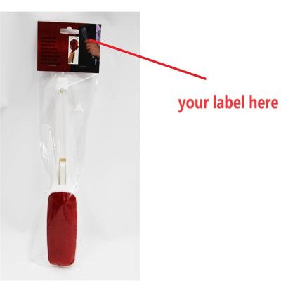 China Dual Sided Rotating Lint Brush for Clothes en venta