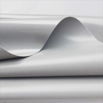 China el PVC brillante 800gsm cubrió la tela plástica de las lonas de la lona/de las tiendas inflables en venta