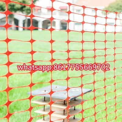 China La red amonestadora tejida naranja se hace de los polyethylenes de alta densidad para la construcción y el puente. en venta
