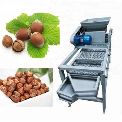 中国 Energy Saving Nuts Shelling Machine Almond Shell Breaker Machine 500KG/H 販売のため