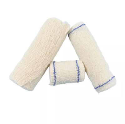 Cina Il cotone medico ha candeggiato l'alto crêpe elastico dell'elastam benda la linea rossa in vendita