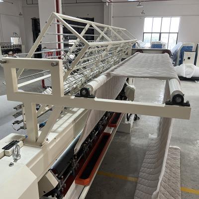 中国 ZOLYTECHは羽毛布団のためのロックのStichの多針のキルトにする機械をコンピュータ化した 販売のため