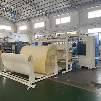 China PIQUER DE ZOLYTECH MULTI-NEEDLE USINENT LE POINT À CHAÎNES AUTOMATISÉ À GRANDE VITESSE POUR LES ÉDREDONS ET LES ÉDREDONS WV15 1500 T/MN for sale