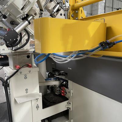 China High Speed Computerized Automatic Flipping Mattress Tape Edge Machine For Mattress 50-500mm Sewing Thickness for sale