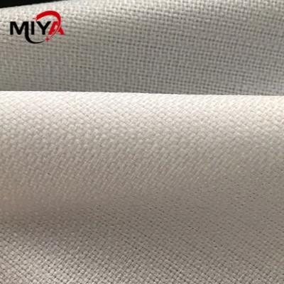 China Poliéster 100% entrelinhando kejme'noykejme fundível tecido Waterjet do Microdot 75gsm à venda