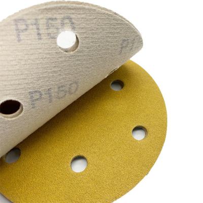 Cina Dischi di sabbia in oro da 5 pollici con appoggio a gancio e loop 17 fori in vendita