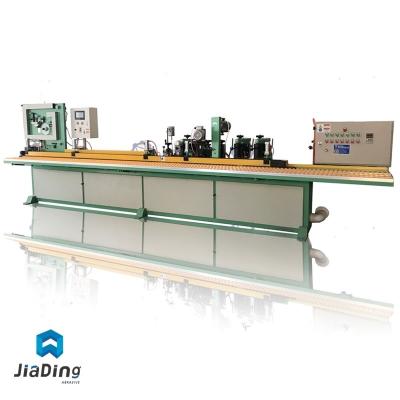 Cina Macchina avanzata di taglio a cintura di sabbia completamente automatica per la produzione di prodotti a cintura abrasiva in vendita