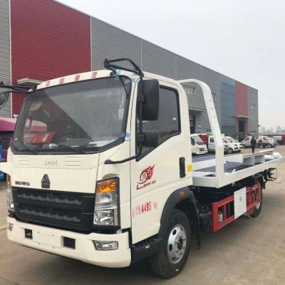 China Sinotruk HOWO 4tons Flatbed Tow Truck 4ton 3-7t One-Towing-Two Platform Wrecker Heavy Duty Truck for sale
