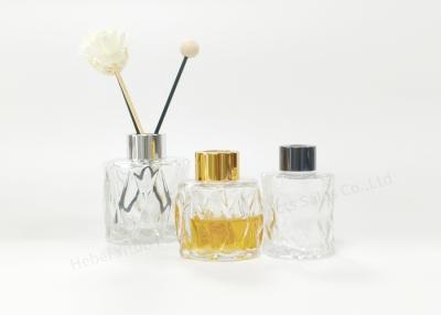 Cina Bottiglie diffusore a bastoncino in vetro con rilievo trasparente per profumo sfuso in vendita