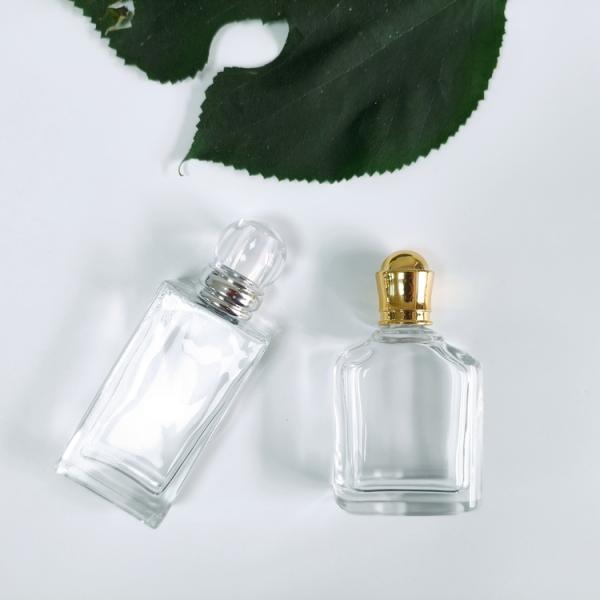 Quality Clear Bulk 1 Oz Refillable Glass Perfume Bottle OEM Logo Round Shape for sale