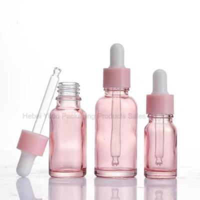 Китай Розовая бутылочка-капельница для эфирного масла 1 унция, круглая стеклянная форма для косметики продается