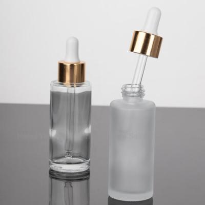China Bulk Dropper Empty Essential Oil Bottles Clear 2oz Customize Logo for sale