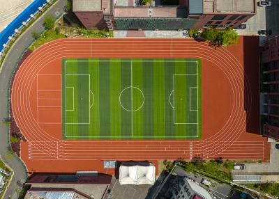 中国 400m標準的なサンドイッチ システム連続したトラック合成ゴムのスポーツの表面仕上げ 販売のため