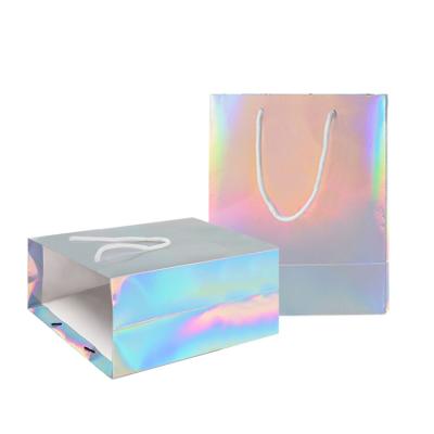 Cina Il logo su ordinazione amichevole di eco di lusso di alta qualità ha stampato il sacco di carta piegante del mestiere del sacchetto della spesa della carta del regalo dei gioielli con la maniglia in vendita