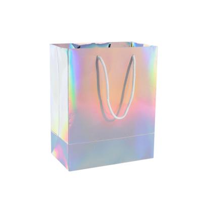 Cina Sacco di carta di compera variopinto tagliato del disco del sacchetto della spesa del laser del nastro brillante portatile di plastica del sacco di carta con LOGO Printing in vendita