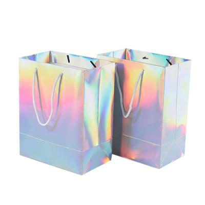 Cina La stampa su ordinazione di dimensione A5 ha reso a borsa lanciante del regalo di acquisto i sacchi di carta brillanti del laser in vendita