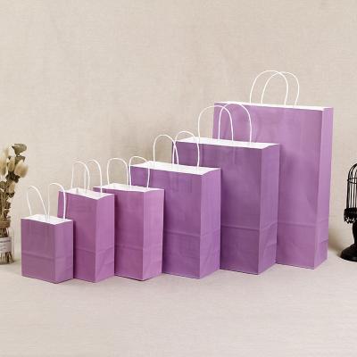 Cina il logo che porpora della stagnola delle borse di abitudine dei produttori l'acquisto porpora della carta kraft porta la borsa del regalo ha stampato i sacchi di carta di lusso con la maniglia in vendita