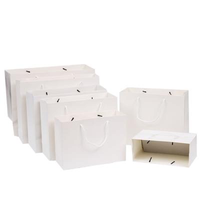 China Printed Brown Custom Logo Gift Bags Shopping Kraft Packaging for sale