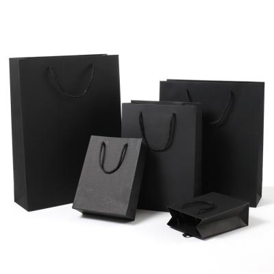 China Wholesale Custom Logo Luxury Black Reusable Shopping Bag Packaging Printed Thank You Paper Gift Bags With Ribbon Handles for sale