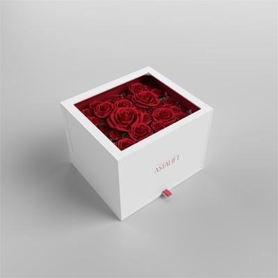 Cina Il colore su misura di CMYK Pantone ha stampato il contenitore di carta di fiore di due strati con la chiara finestra del PVC in vendita