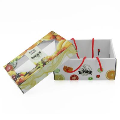 中国 オーダーメイドデザイン 果物と野菜のハンドル付きのゴロゴロ紙ギフトボックス 販売のため