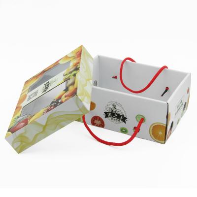 中国 オーダーメイドデザイン 果物と野菜のハンドル付きのゴロゴロ紙ギフトボックス 販売のため