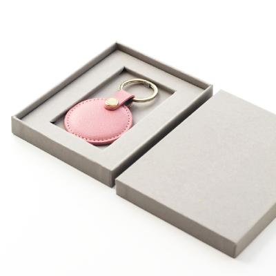 China Caixa de embalagem de chaveira mini-vazia pequena personalizada Caixa de presente para chaveira à venda